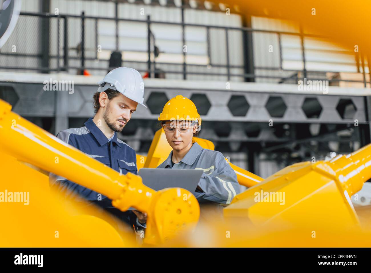 engineer team working together inspection quality robot arm in robot ...