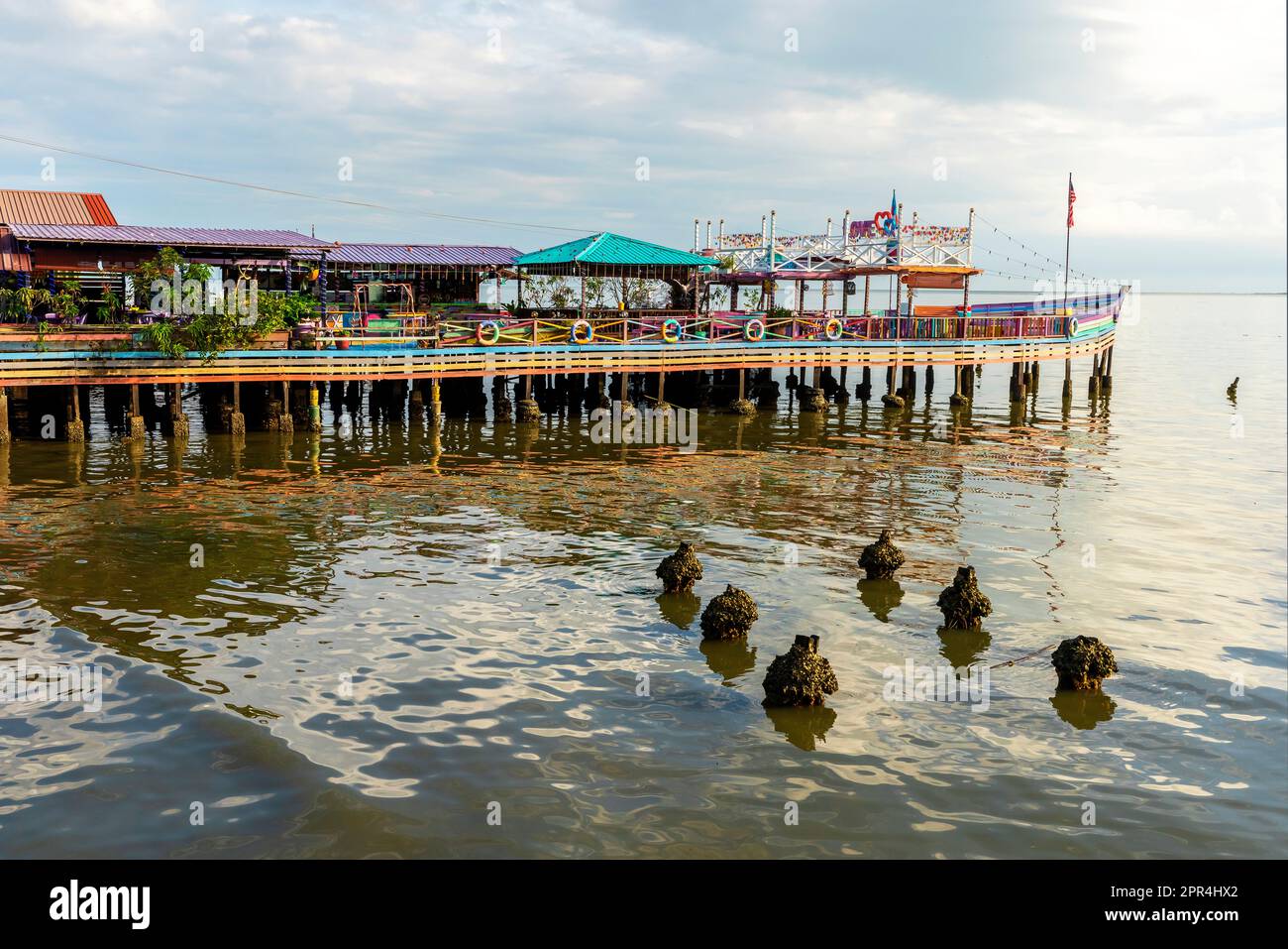 Jetty in Sandakan fishing village, Sabah, Borneo, Malaysia Stock Photo ...