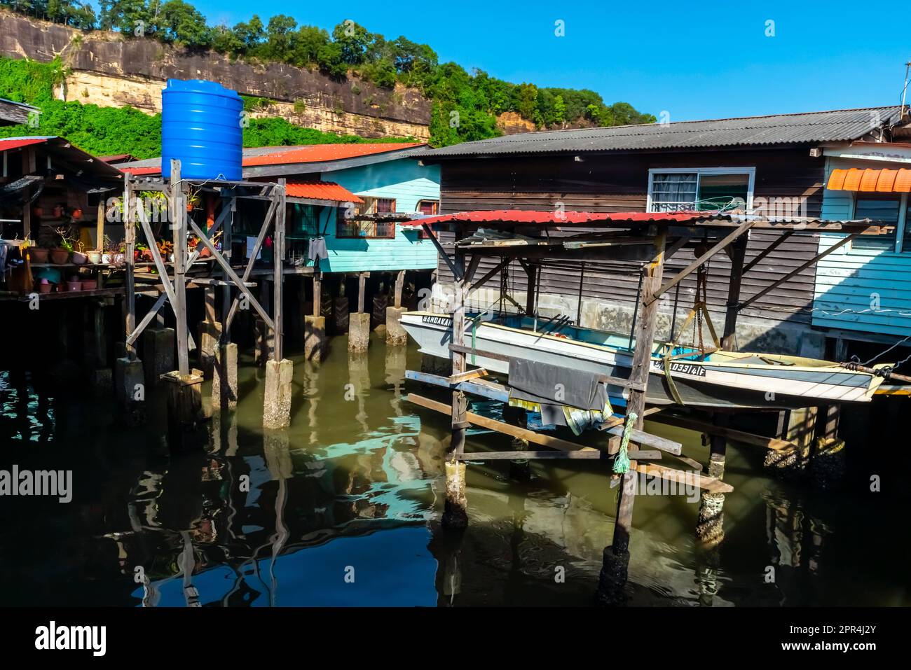 Jetty in Sandakan fishing village, Sabah, Borneo, Malaysia Stock Photo ...