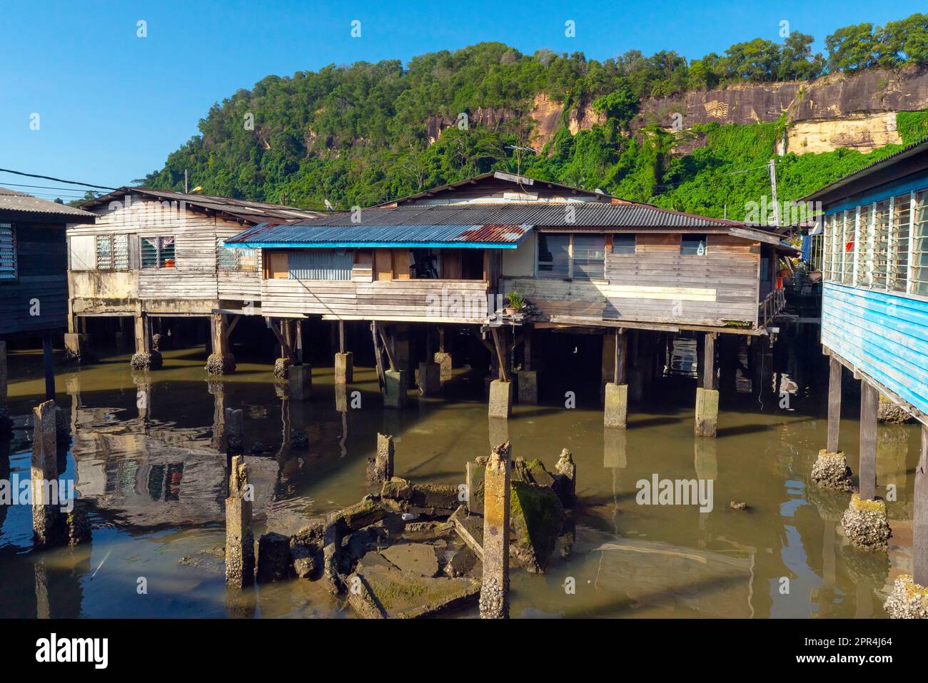 Jetty in Sandakan fishing village, Sabah, Borneo, Malaysia Stock Photo ...