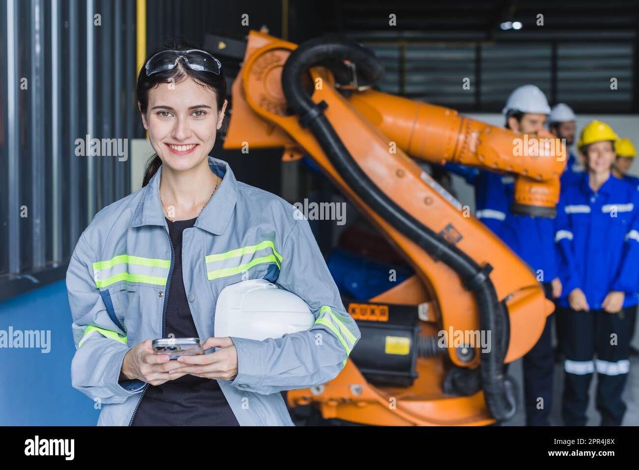 Engineer woman team worker work in Machine Robotic modern Automation ...