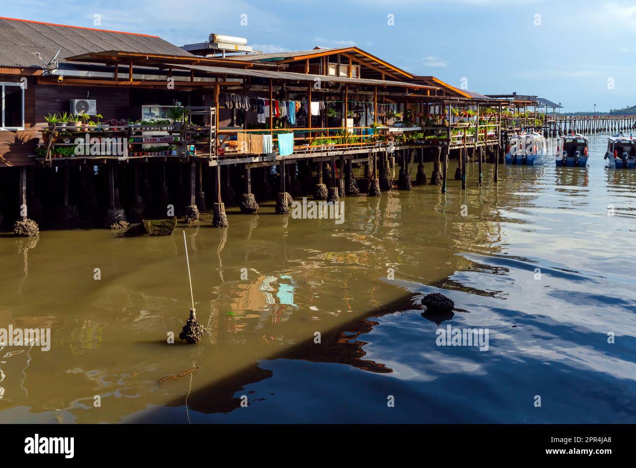 Jetty in Sandakan fishing village, Sabah, Borneo, Malaysia Stock Photo ...