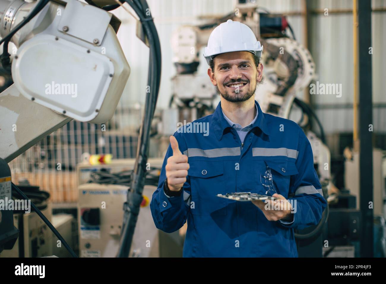 Engineer worker Hispanic Latin in Machine Robotic modern Automation ...