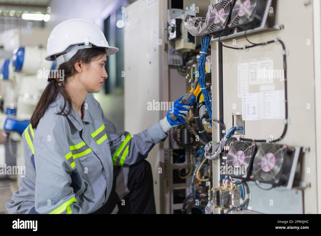 electricity engineer female working check service high voltage ...