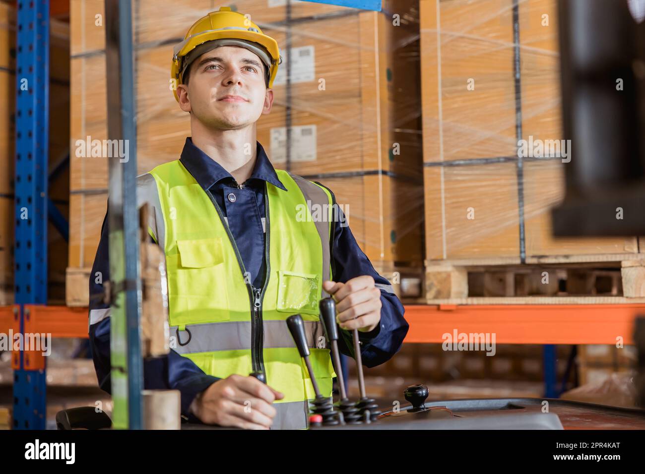 Caucasian male worker working in warehouse goods store. inventory staff ...