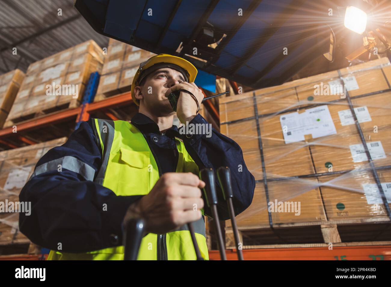Caucasian male worker working in warehouse goods store. inventory staff ...