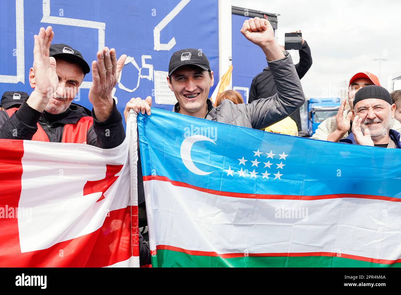 26 April 2023, Hesse, Gräfenhausen: Striking truck drivers rejoice at ...