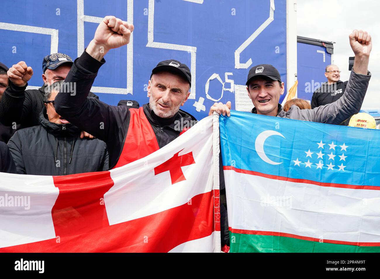 26 April 2023, Hesse, Gräfenhausen: Striking truck drivers rejoice at ...