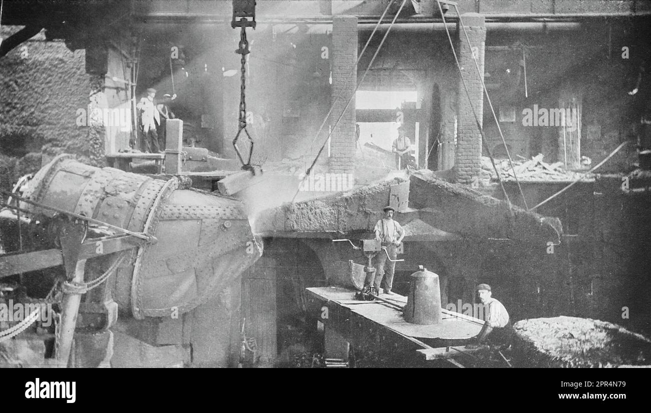 Bessemer converter: Iron from the furnace being poured into the ...