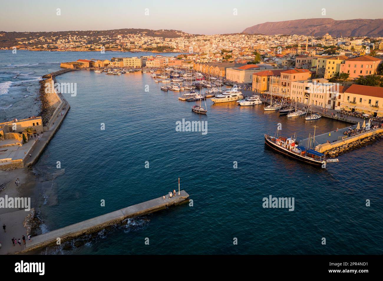 Aerial view of the entrance to the main harbour of the port of Chania ...