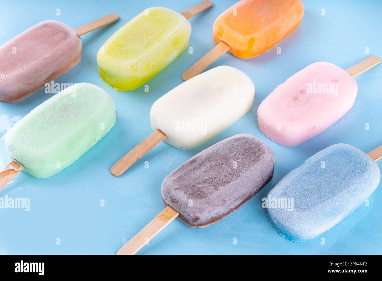 Selection of multicolored ice cream popsicles. Various flavor gelato ...