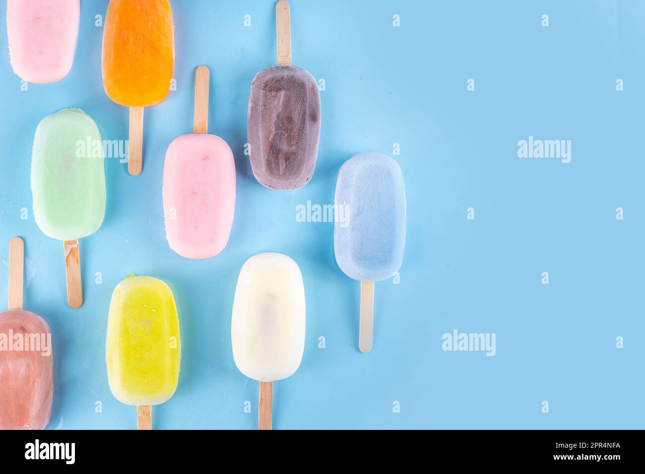 Selection of multicolored ice cream popsicles. Various flavor gelato ...