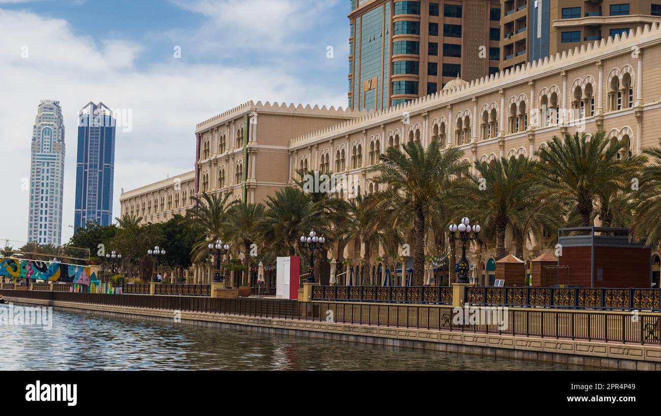 Sharjah city view, high rise buildings with lagoon Stock Photo - Alamy