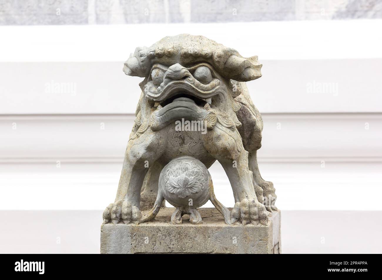 Chinese style lion carved stone on the pedestal is a sacred animal of ...