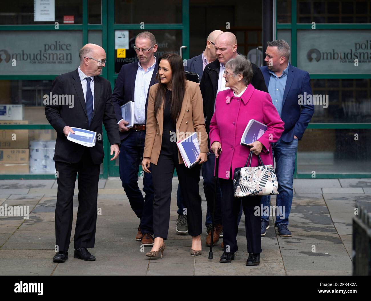 Solicitor Adrian O'Kane (left), Sinn Fein MP Orfhlaith Begley (centre ...