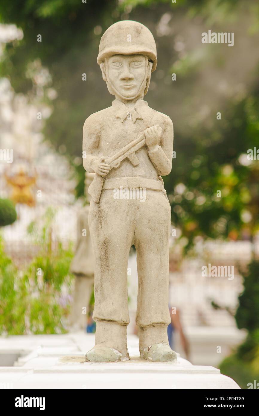 A statue of a soldier standing holding a gun on the platform Stock ...