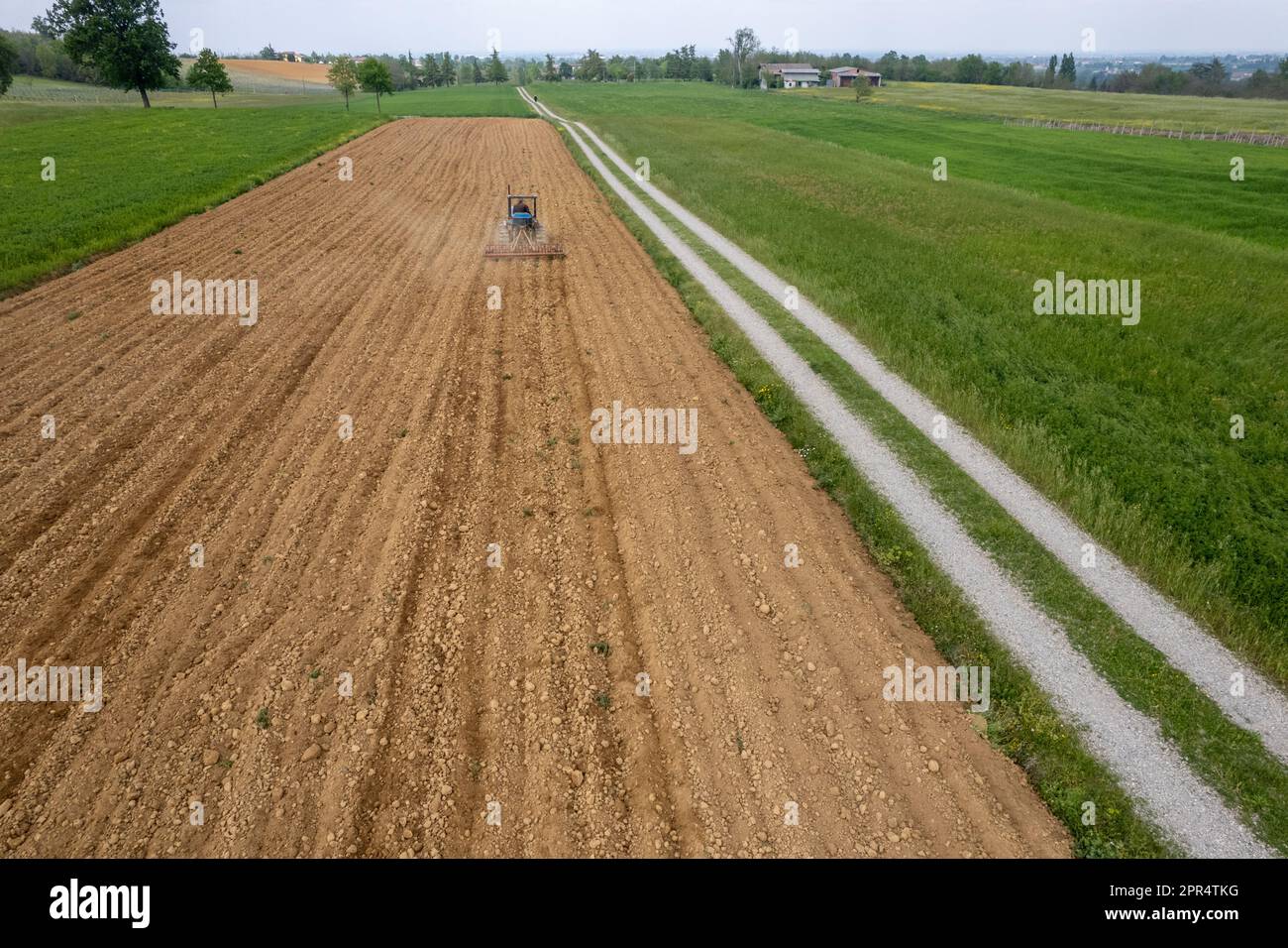 Castell'Arquato, Italy - April 2023 farmer driving crawled tractor in ...