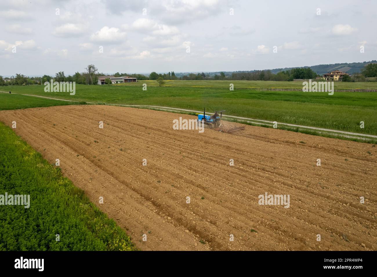 Castell'Arquato, Italy - April 2023 farmer driving crawled tractor in ...