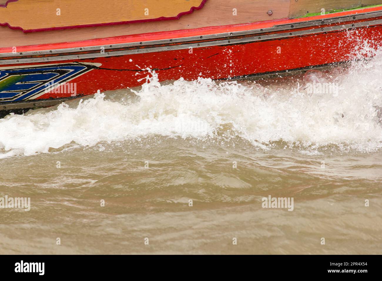 Water splashed from a speed boat in the river Stock Photo - Alamy