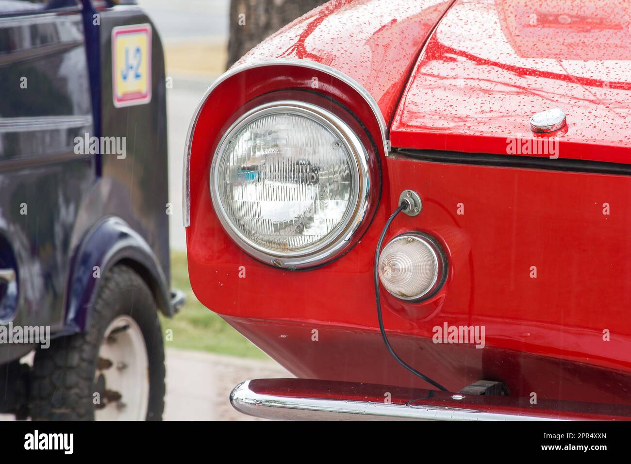 Lights in front of a vintage car with a unique sphere Stock Photo - Alamy