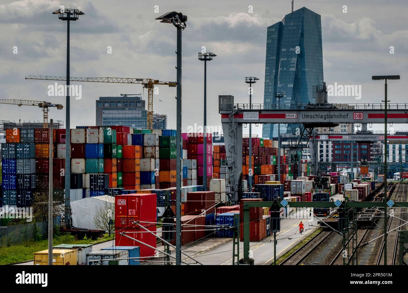Containers are piled up at a cargo terminal of Deutsche Bahn in ...