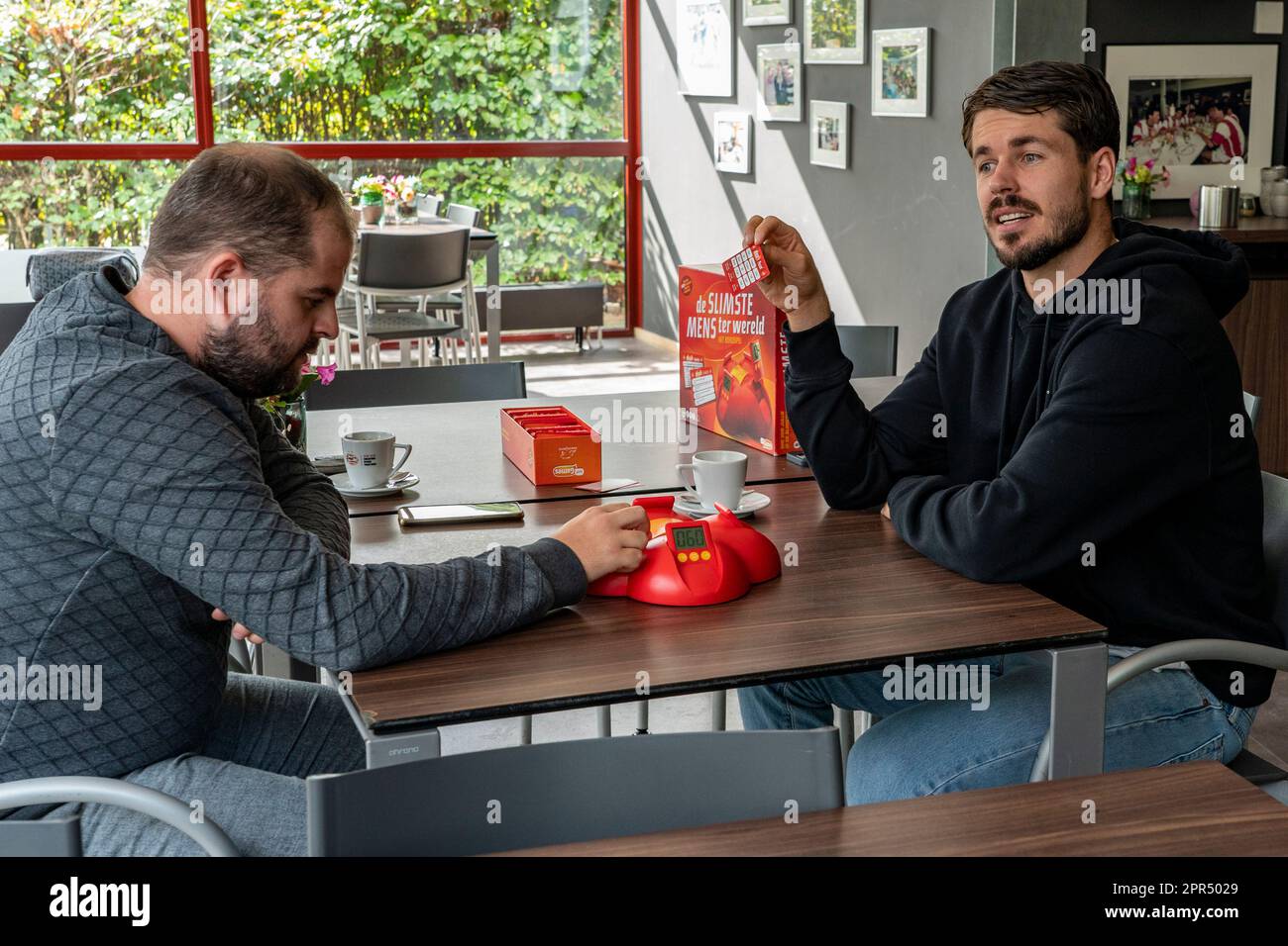 EINDHOVEN, NETHERLANDS - SEPTEMBER 19: journalist Tim Beck and Marco ...