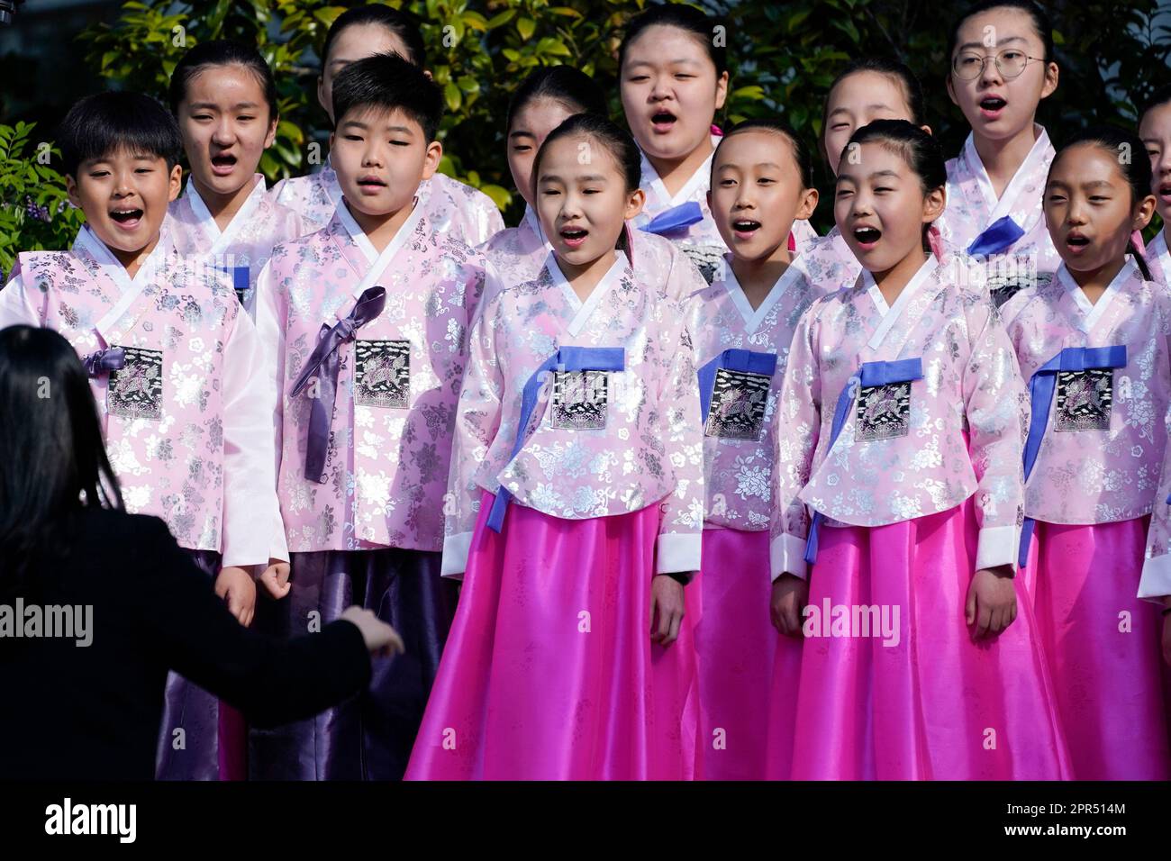 Children sing as they wait for President Joe Biden and South Korea's ...