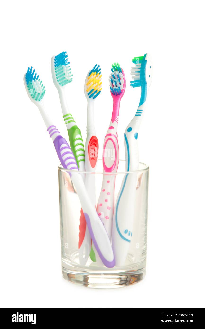 Toothbrushes in glass isolated on white background. Top view Stock ...