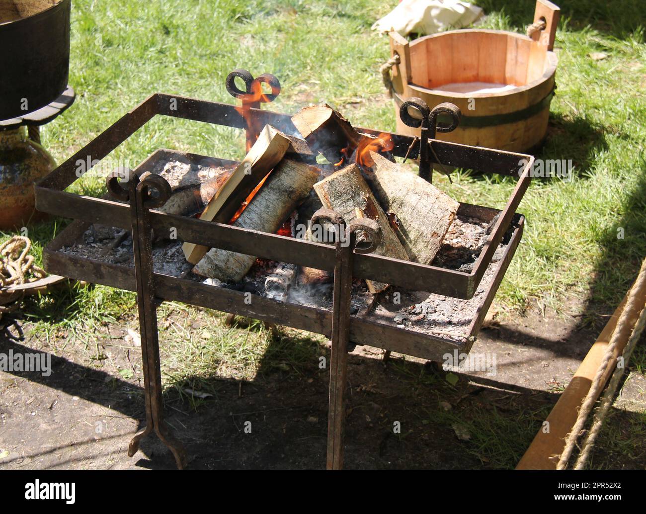A Vintage Set-Up of a Wood Log Cooking Fire Stock Photo - Alamy