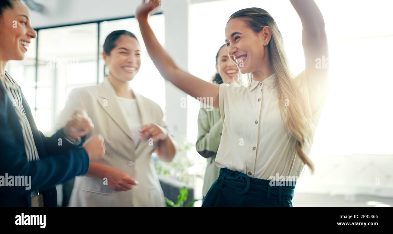 Business woman dance, celebration and staff dancing with a smile ...