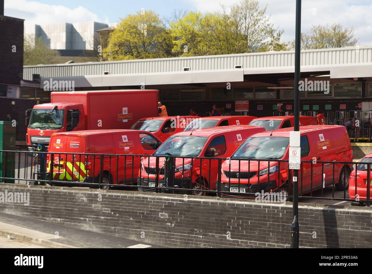 Royal Mail electric vehicles parked and charging at the Royal Mail ... Royal Mail electric vehicles parked and charging at the Royal Mail ...