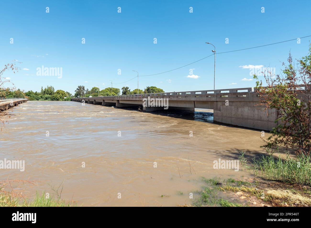 The old and new road bridges over a flooded Orange River at Upington in ...