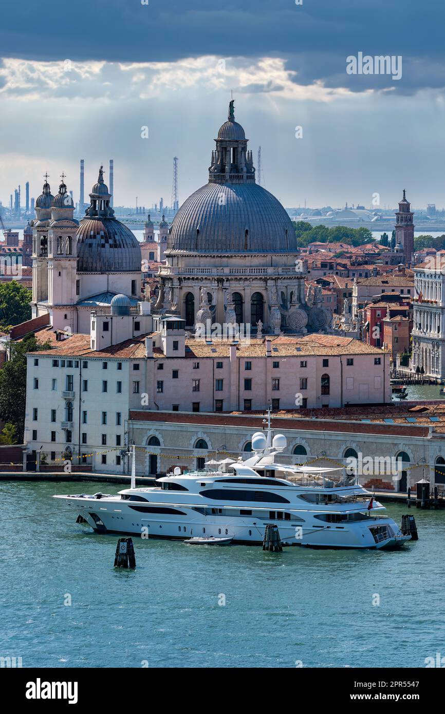 Yacht in front of the 17th century baroque church of Santa Maria della Salute, Venice, Italy ...