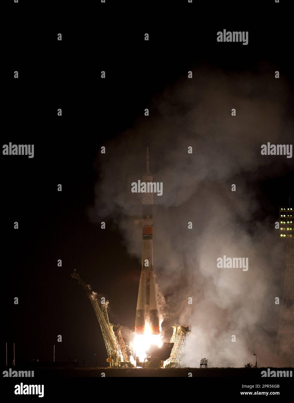 The Soyuz TMA-01M rocket launches from the Baikonur Cosmodrome in ...