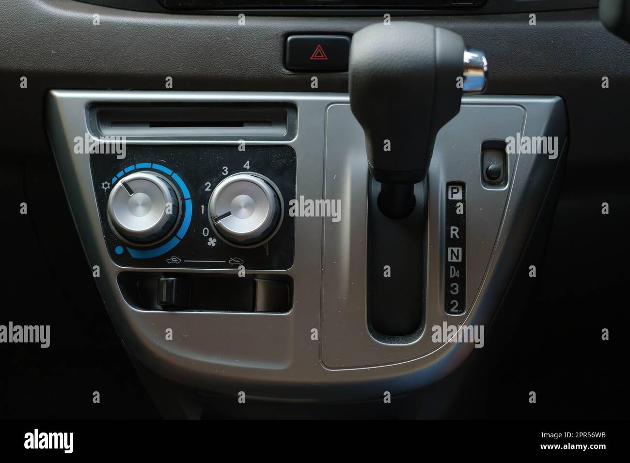 Air conditioner controls with knobs and automatic transmission handle ...