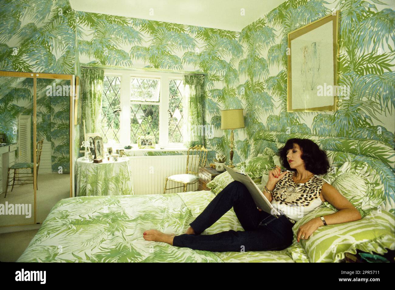 Joan Collins photographed in her UK home in 1984 Stock Photo - Alamy