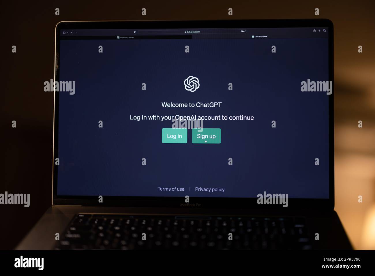 In this photo illustration, the ChatGPT log seen displayed on a laptop ...