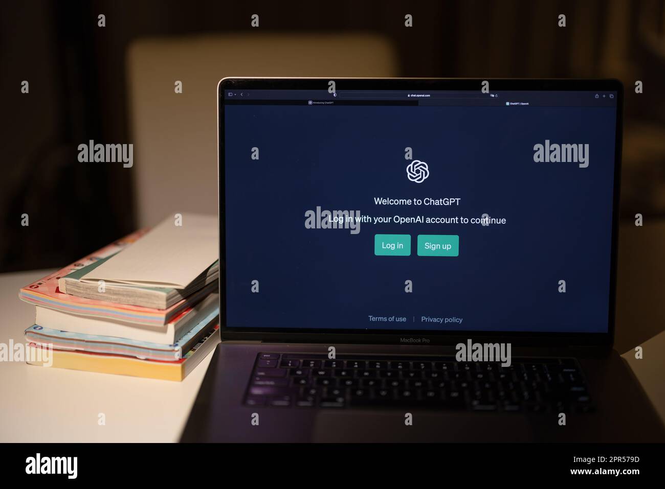 In this photo illustration, the ChatGPT log seen displayed on a laptop ...