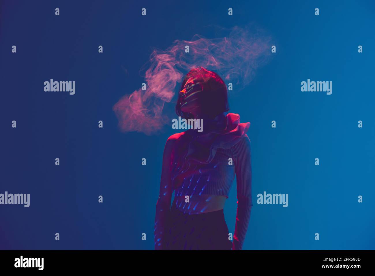 Portrait of beautiful sad woman, girl using vape, electronic cigarette ...