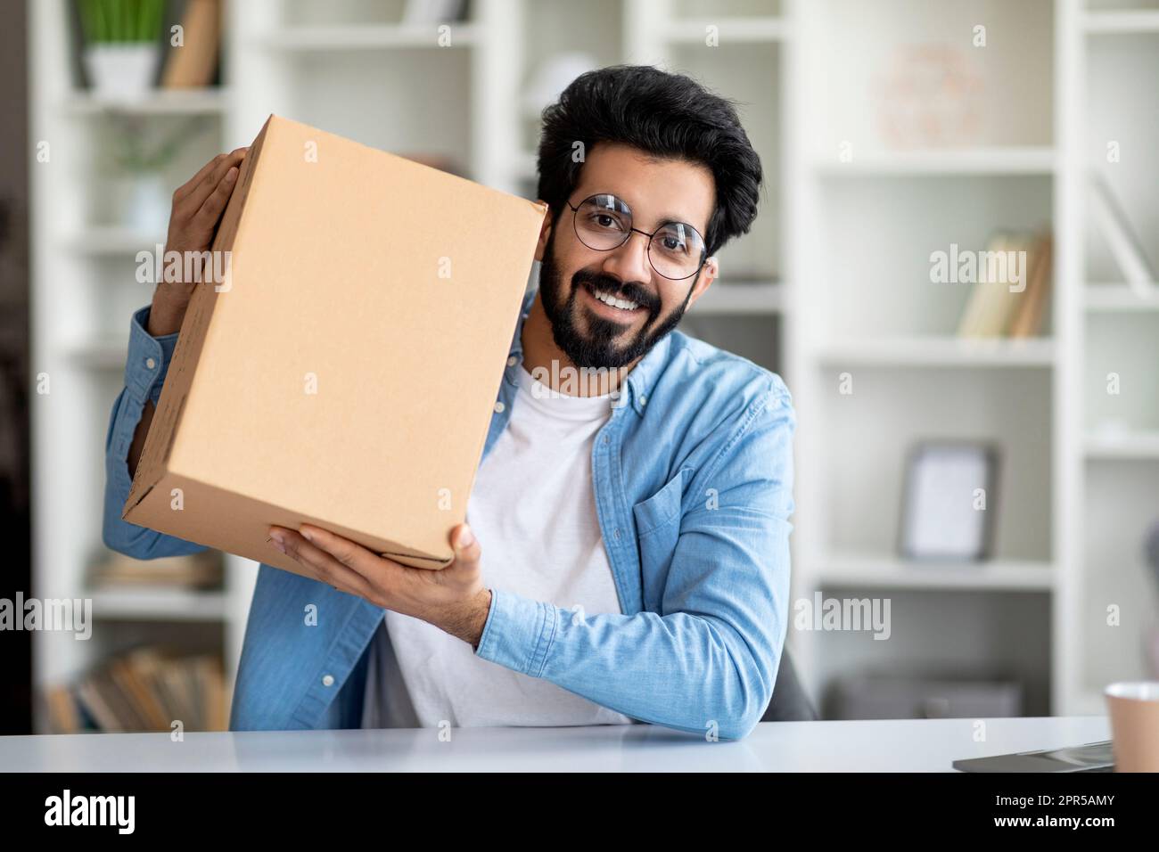 Delivery Concept. Happy Indian Man Showing Big Cardboard Box At Camera ...