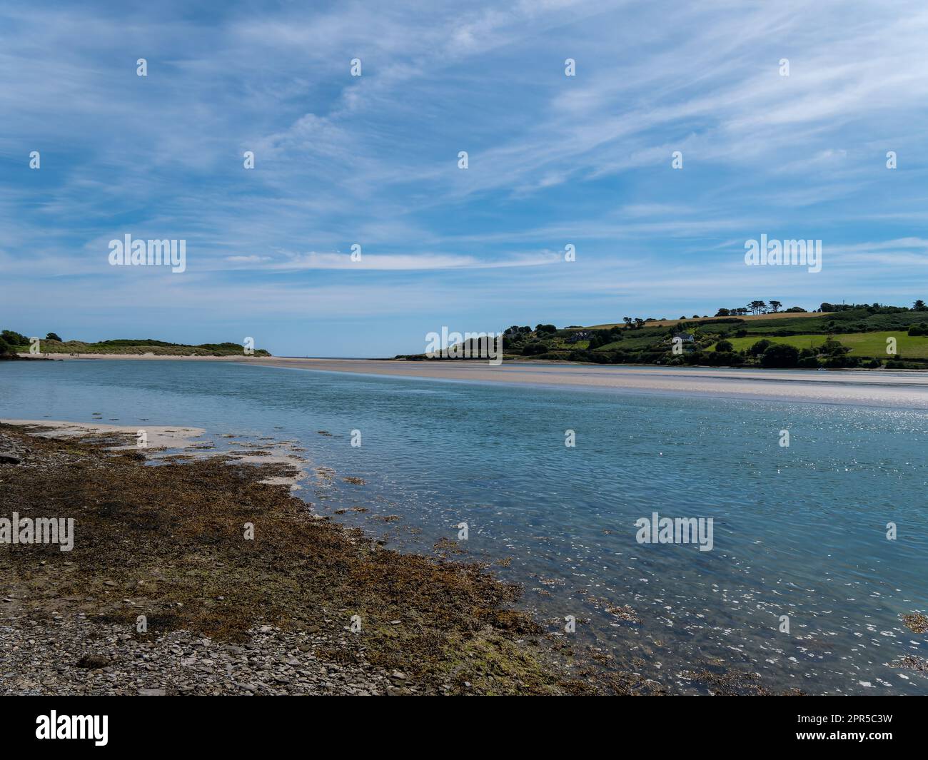 Beautiful blue sky with white clouds over the sea coast in Ireland ...