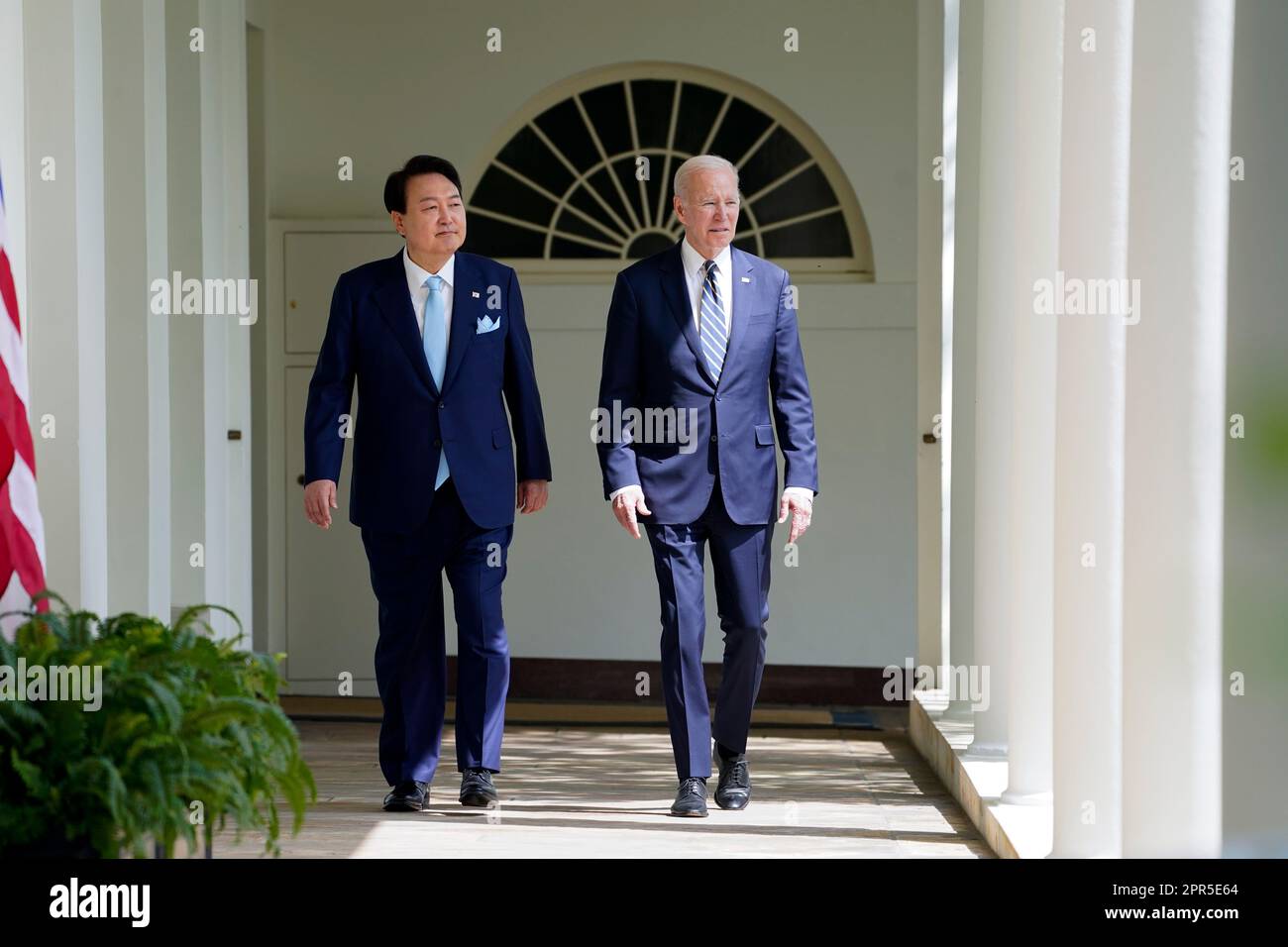 President Joe Biden and South Korea's President Yoon Suk Yeol walk ...