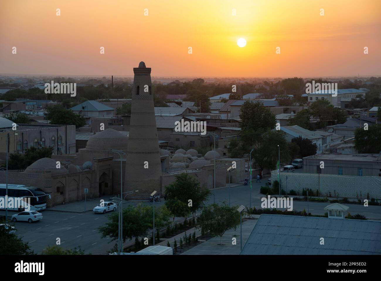 KHIVA, UZBEKISTAN - SEPTEMBER 06, 2022: Sunset over the old town. Khiva ...