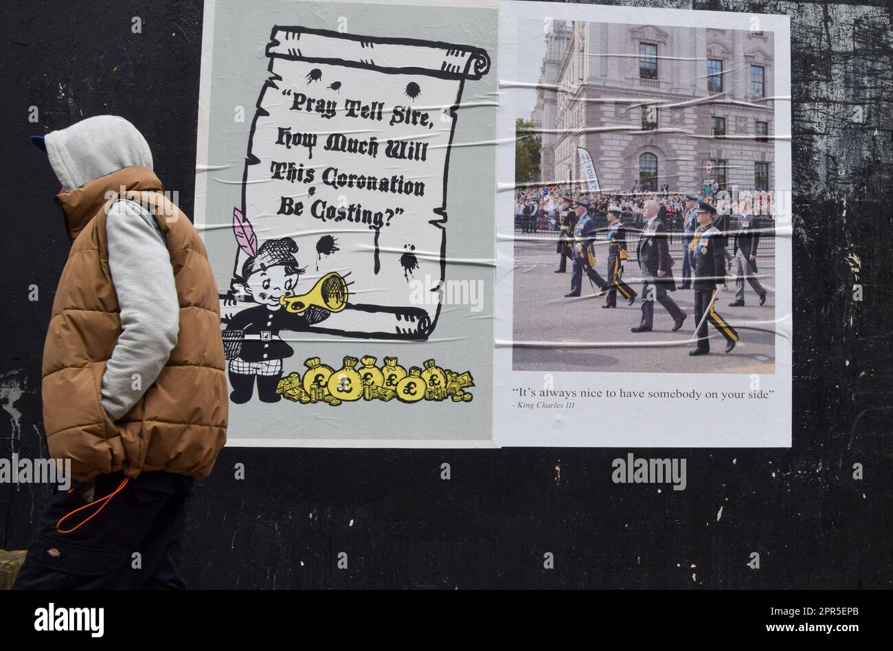 London, England, UK. 26th Apr, 2023. A pedestrian passes by a pair of ...