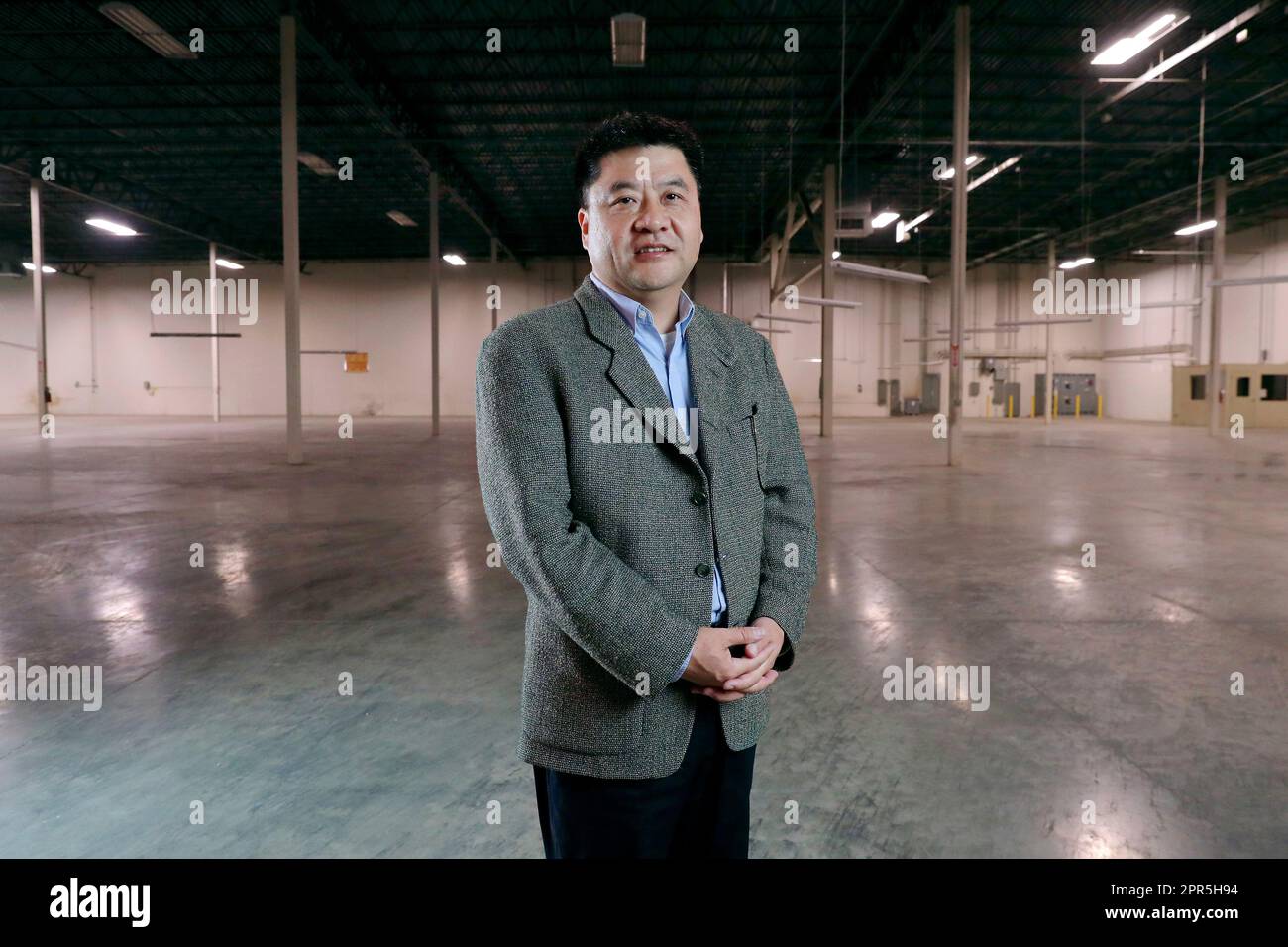 Jun Zhuge, COO of SEG Solar, at their newly acquired location on Telge ...