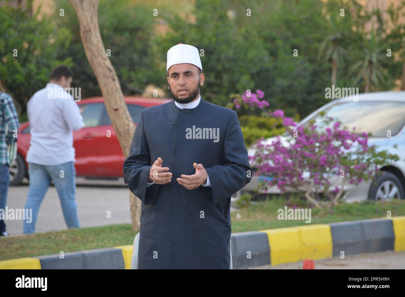 Cairo, Egypt, April 21 2023: A mosque preacher Imam performs Eid Al ...