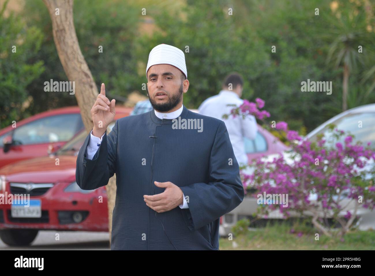 Cairo, Egypt, April 21 2023: A mosque preacher Imam performs Eid Al ...