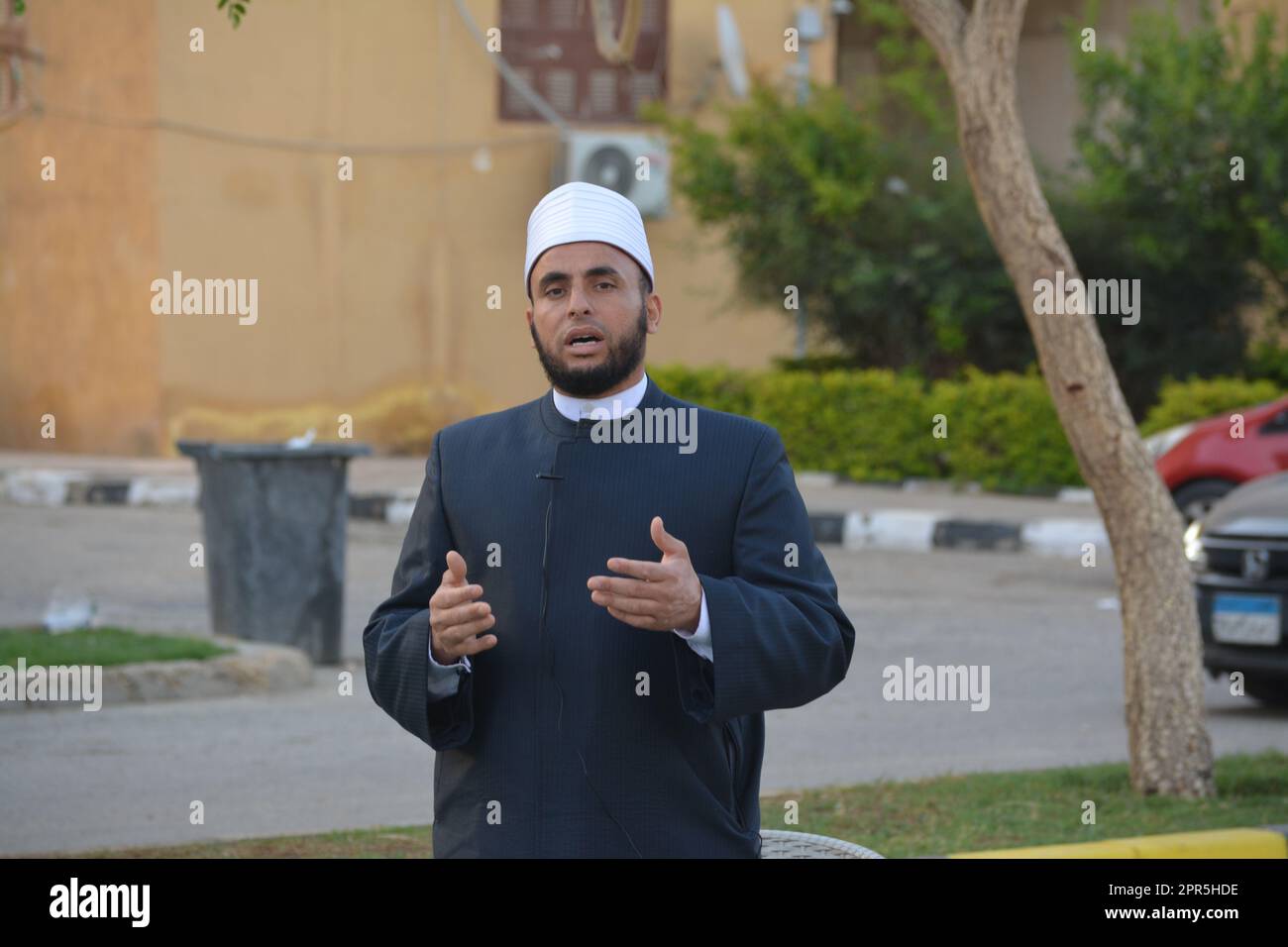 Cairo, Egypt, April 21 2023: A mosque preacher Imam performs Eid Al ...