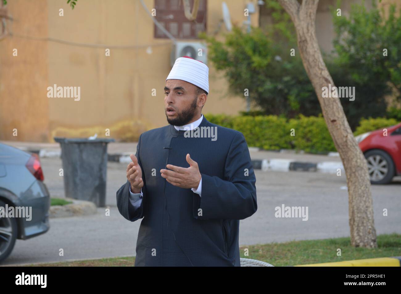 Cairo, Egypt, April 21 2023: A mosque preacher Imam performs Eid Al ...