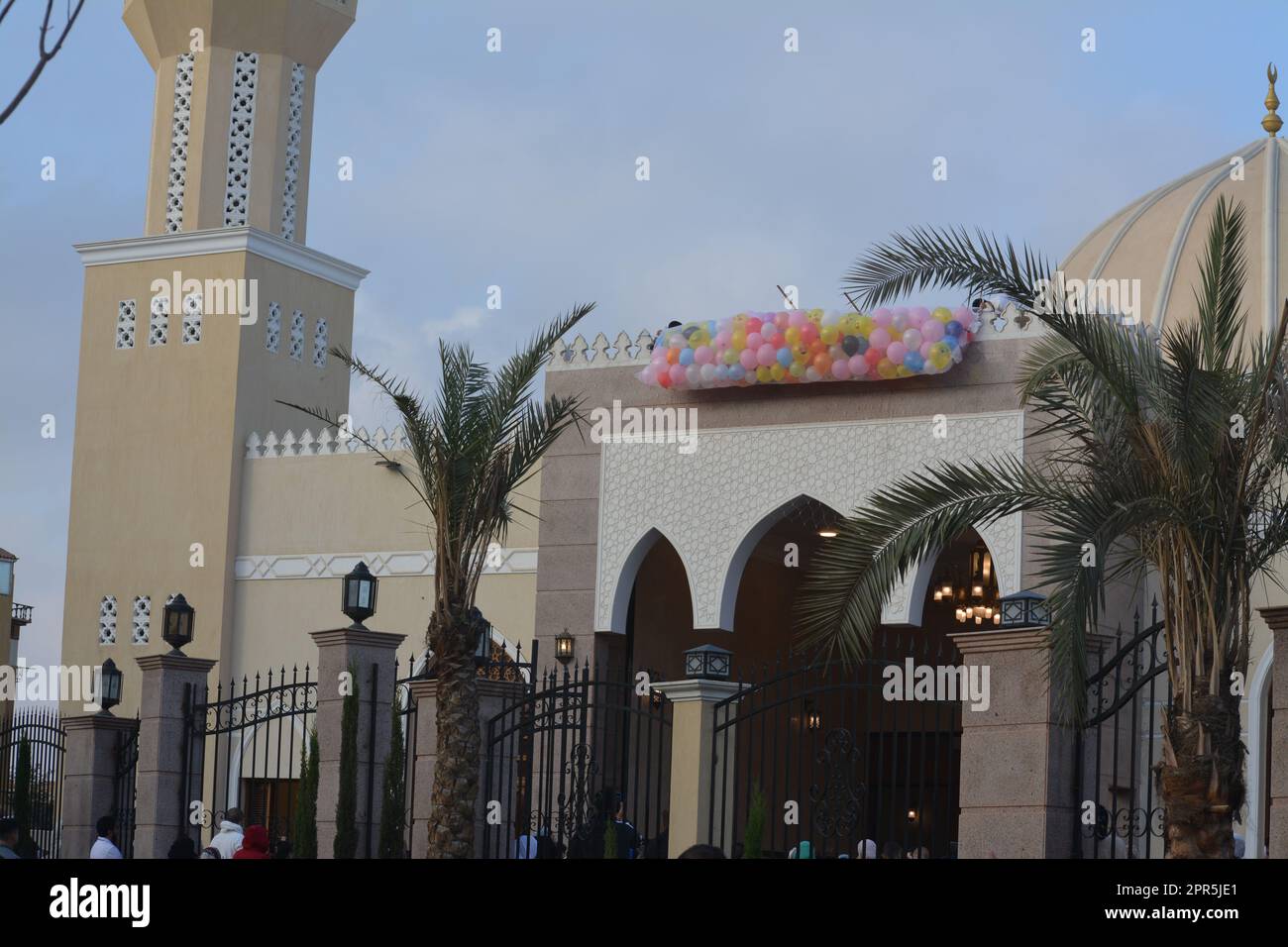 Cairo, Egypt, April 21 2023: Throwing balloons for kids and children after Eid El Fetr Islamic ...